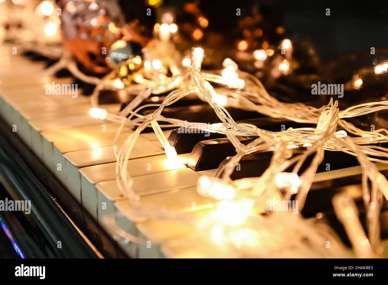 Glowing lights on piano keys, closeup Stock Photo - Alamy