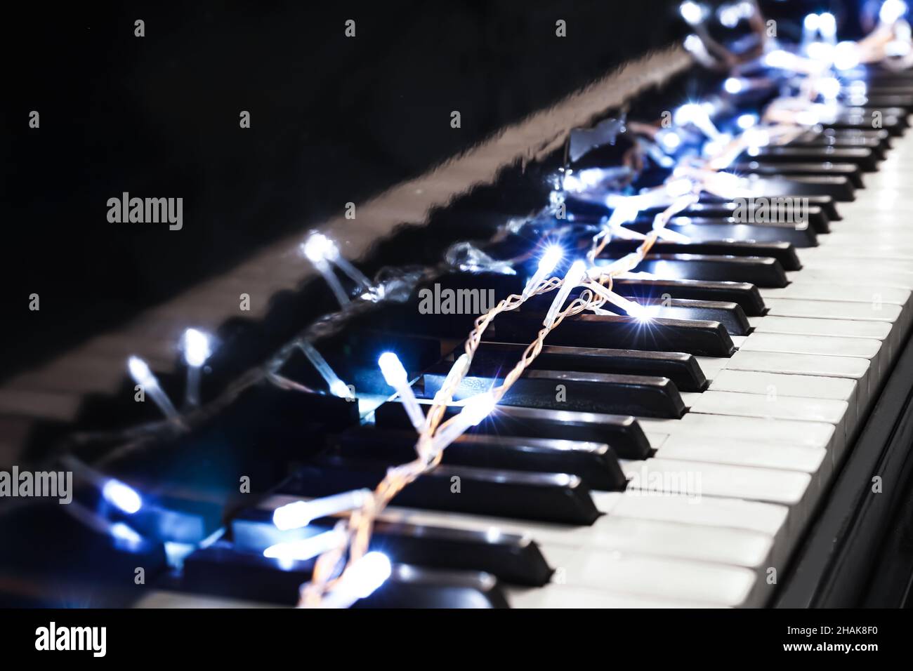 Glowing lights on piano keys, closeup Stock Photo - Alamy