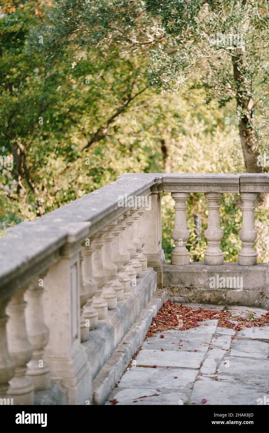 Stone balustrade on the terrace overlooking green trees Stock Photo - Alamy