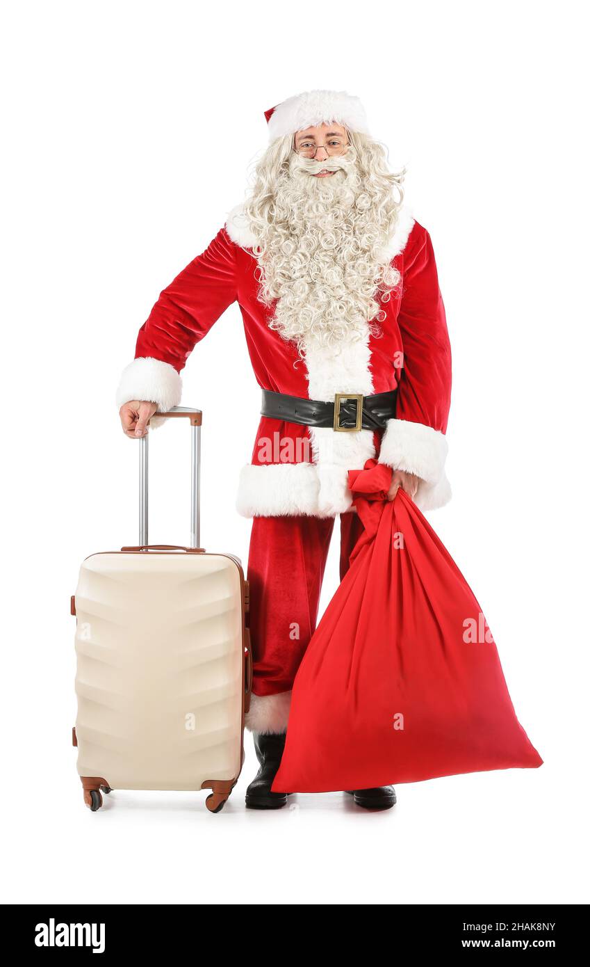 Santa Claus with bag and suitcase on white background Stock Photo - Alamy
