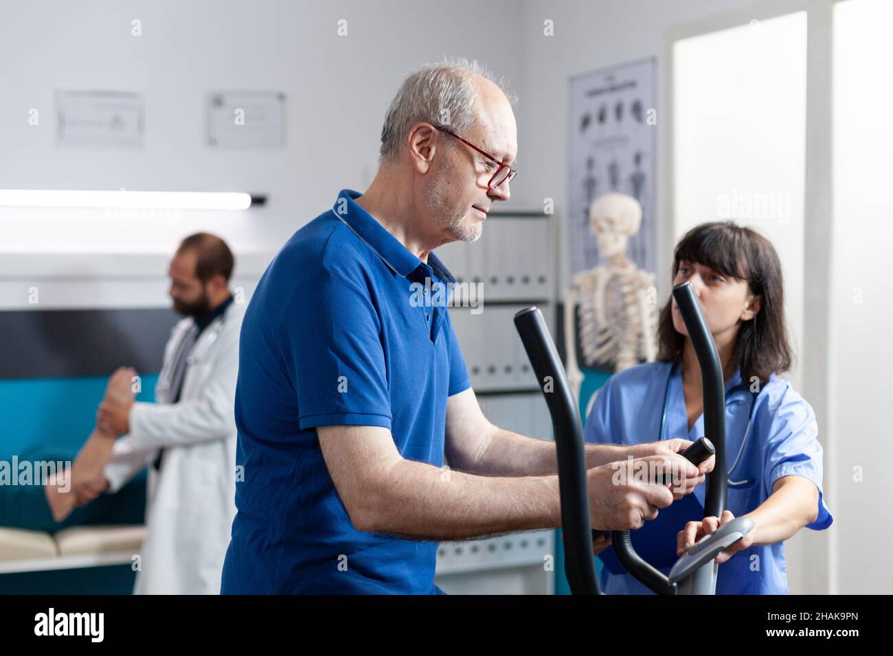 Man with leg injury doing physiotherapy for medical recovery. Senior ...