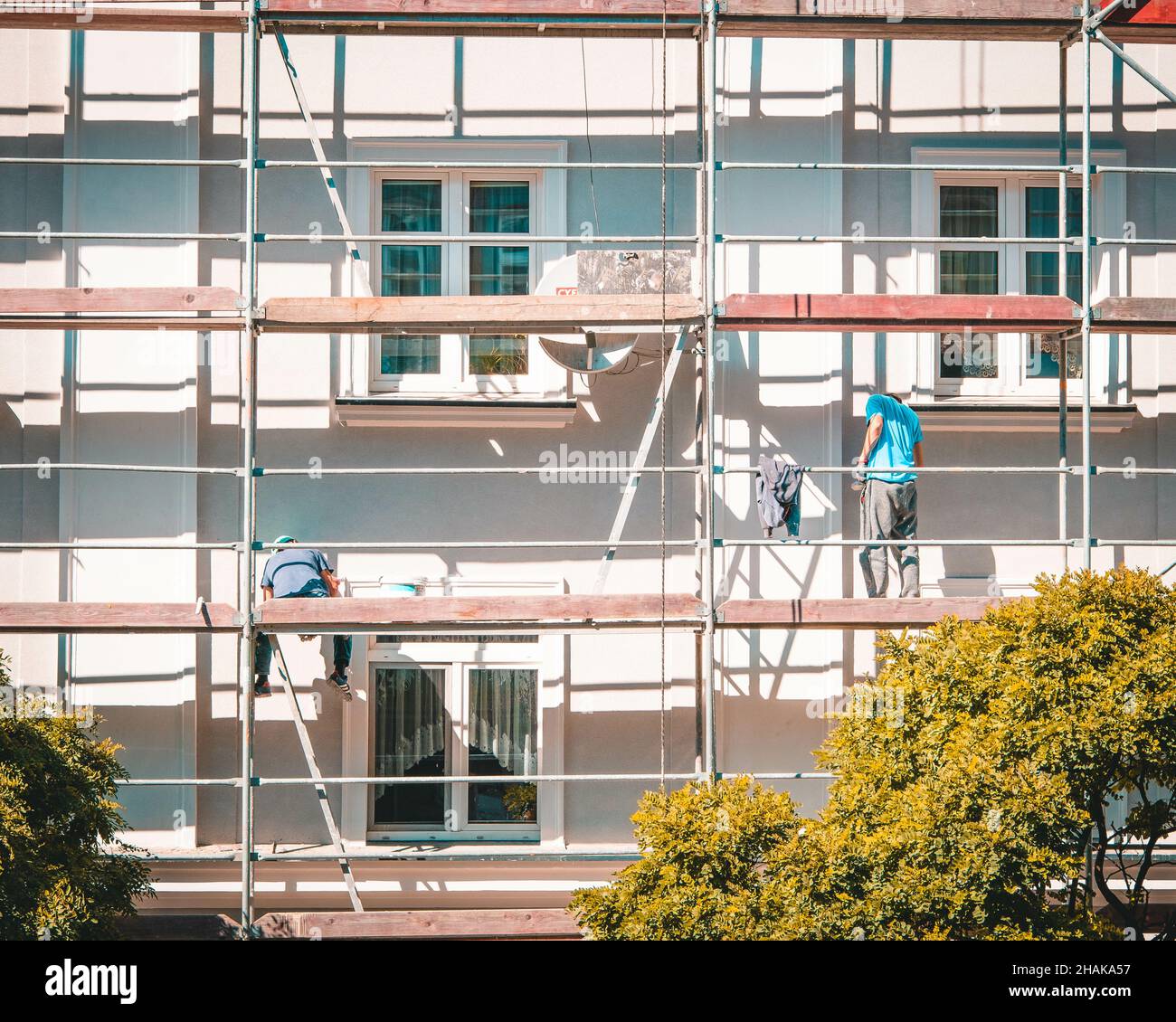 Workers in the construction area of the building Stock Photo - Alamy