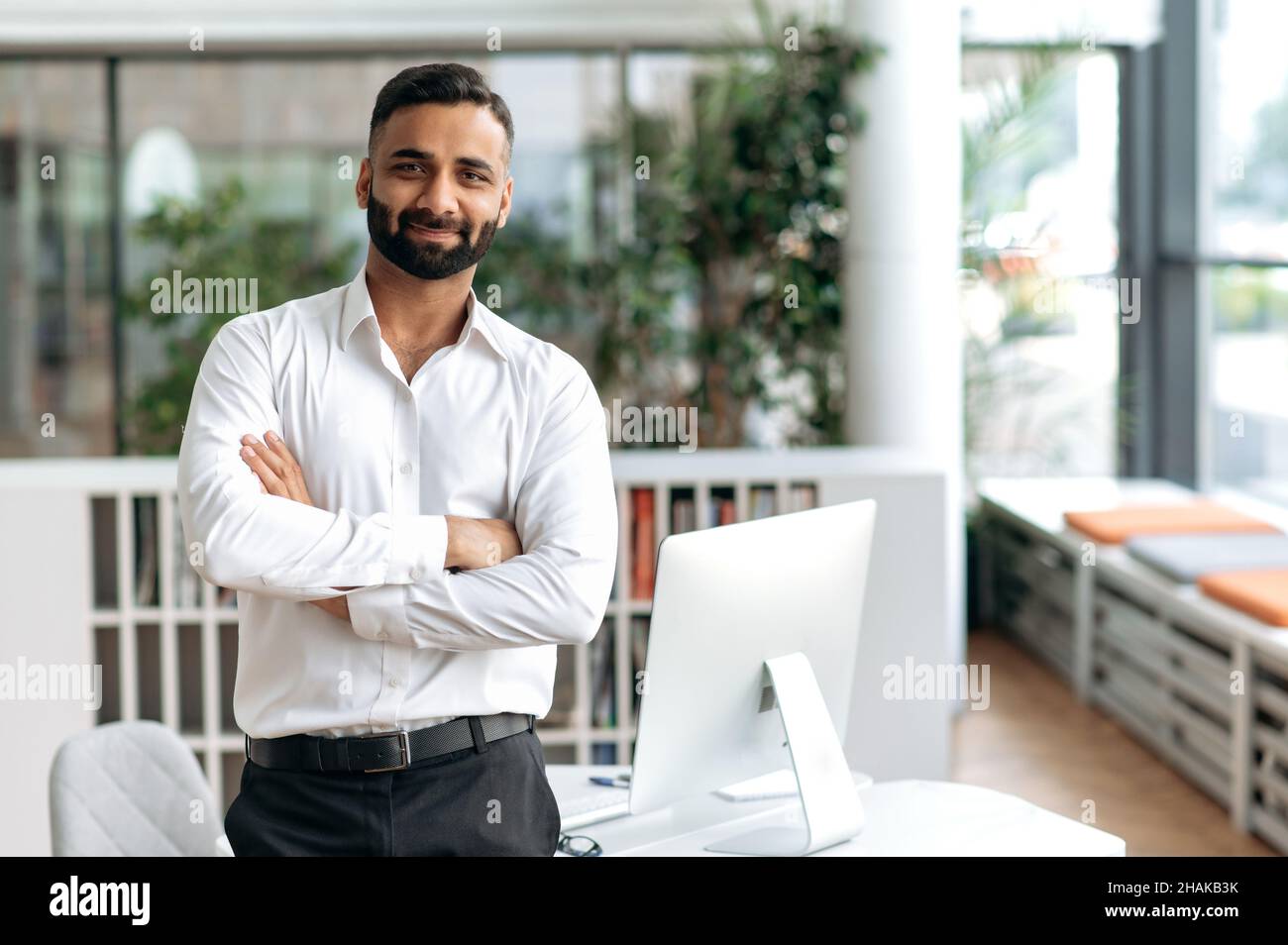 Portrait of successful smart happy handsome Indian businessman, top ...