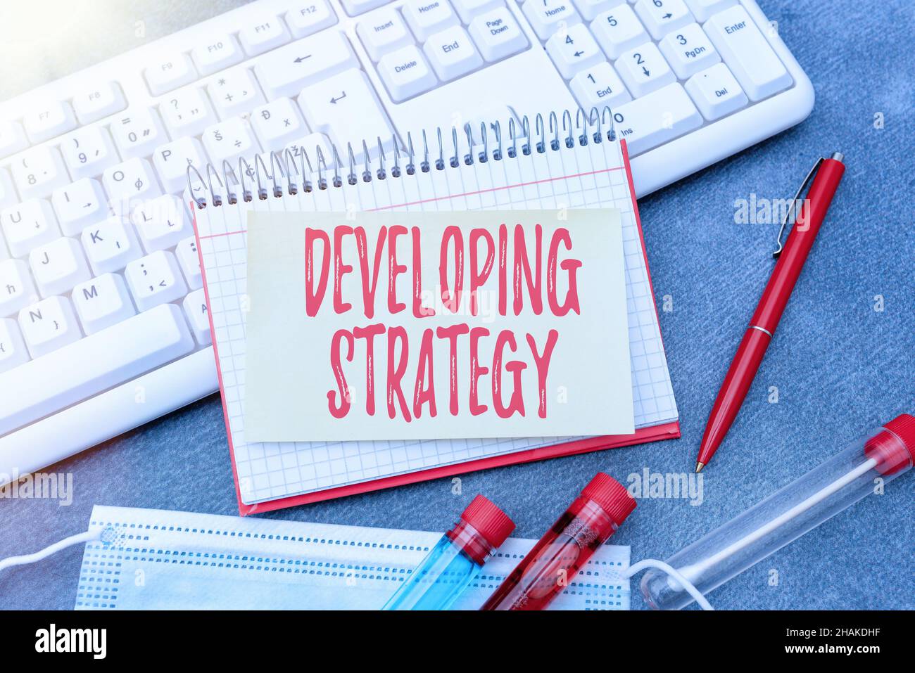 Hand writing sign Developing Strategy. Business concept Organizations ...
