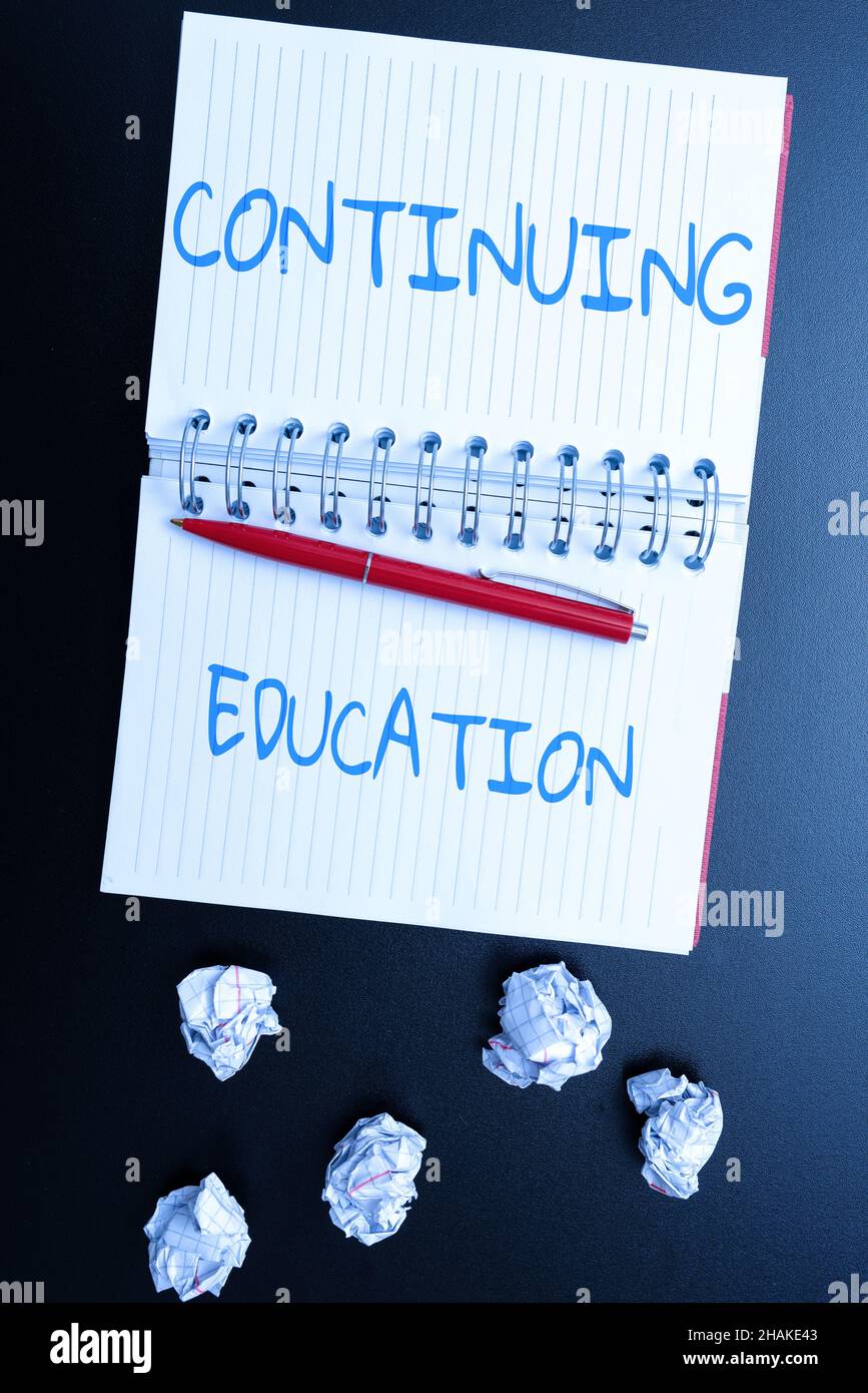 Sign displaying Continuing Education. Word Written on Continued ...