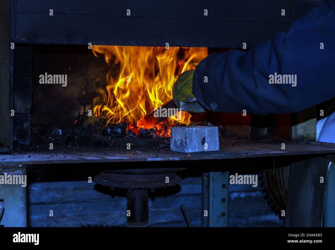 The blacksmith heats the metal to just the right temperature before ...