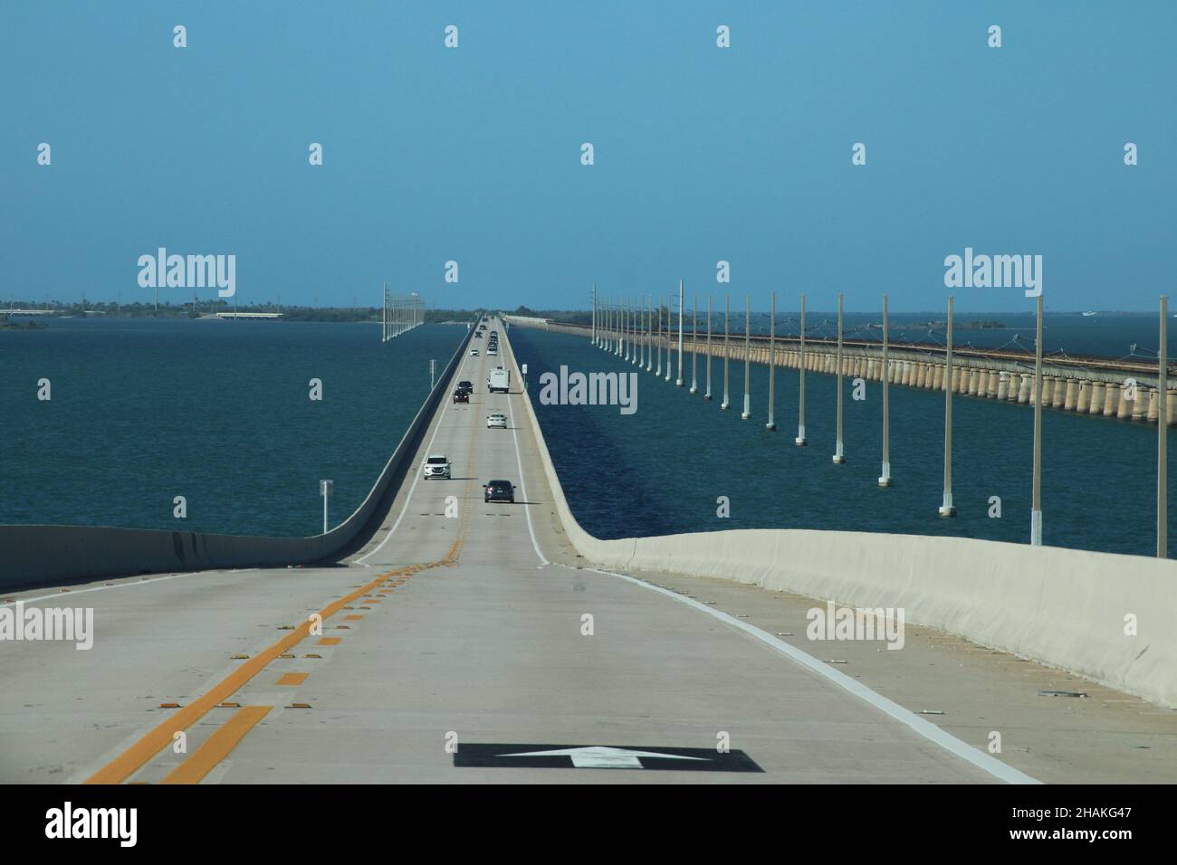 Car driving down the seven-mile bridge, with the Florida Keys in the ...