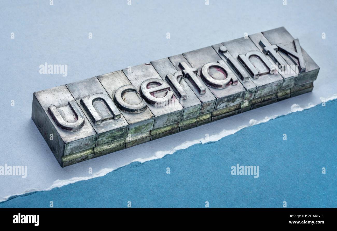 uncertainty word abstract in gritty vintage letterpress metal types ...