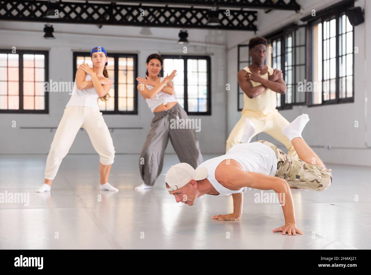 People practicing hip-hop movements in dancing class Stock Photo - Alamy