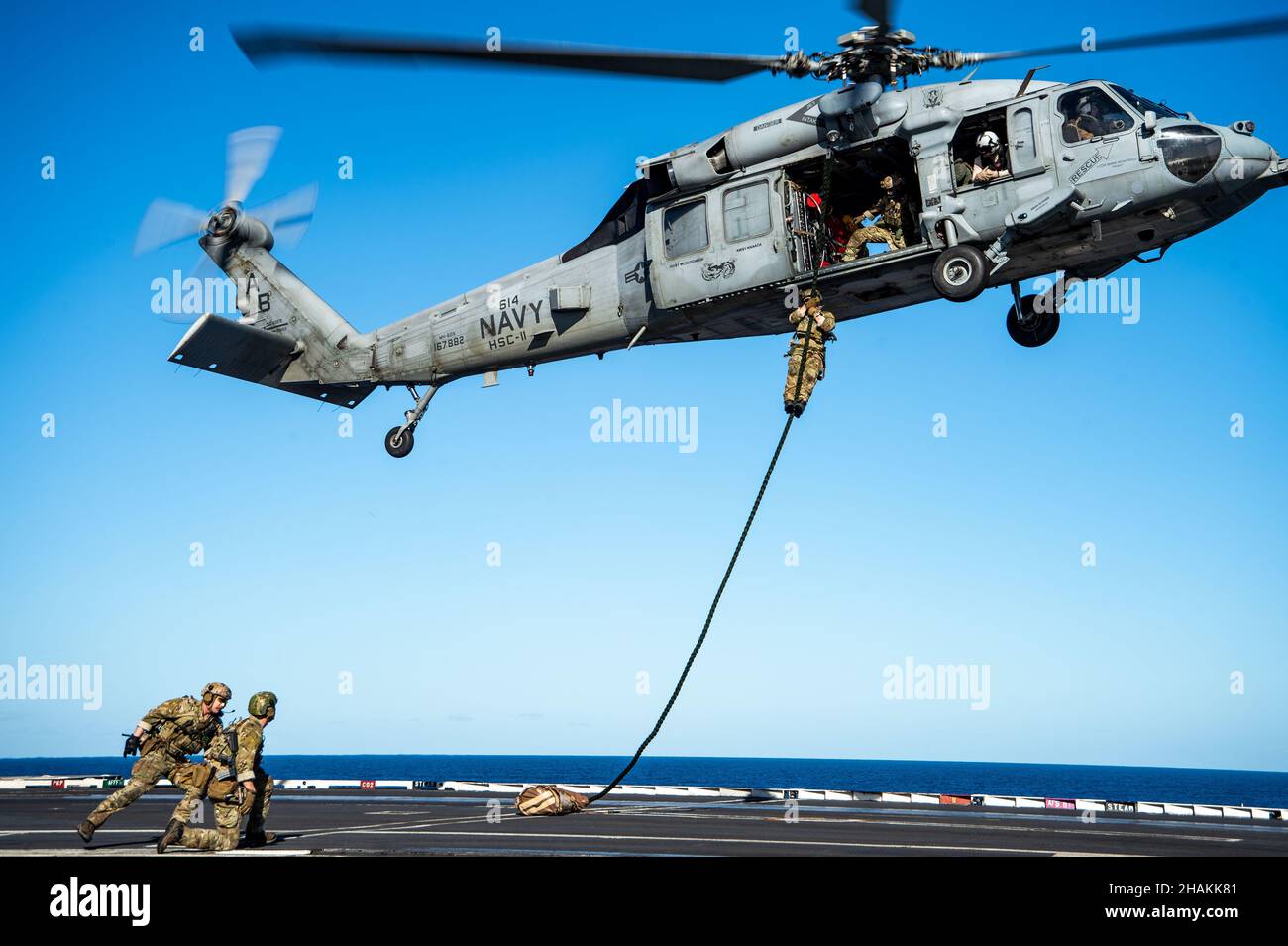 211210-N-DH793-1206 ATLANTIC OCEAN (Dec. 10, 2021) Sailors assigned to ...