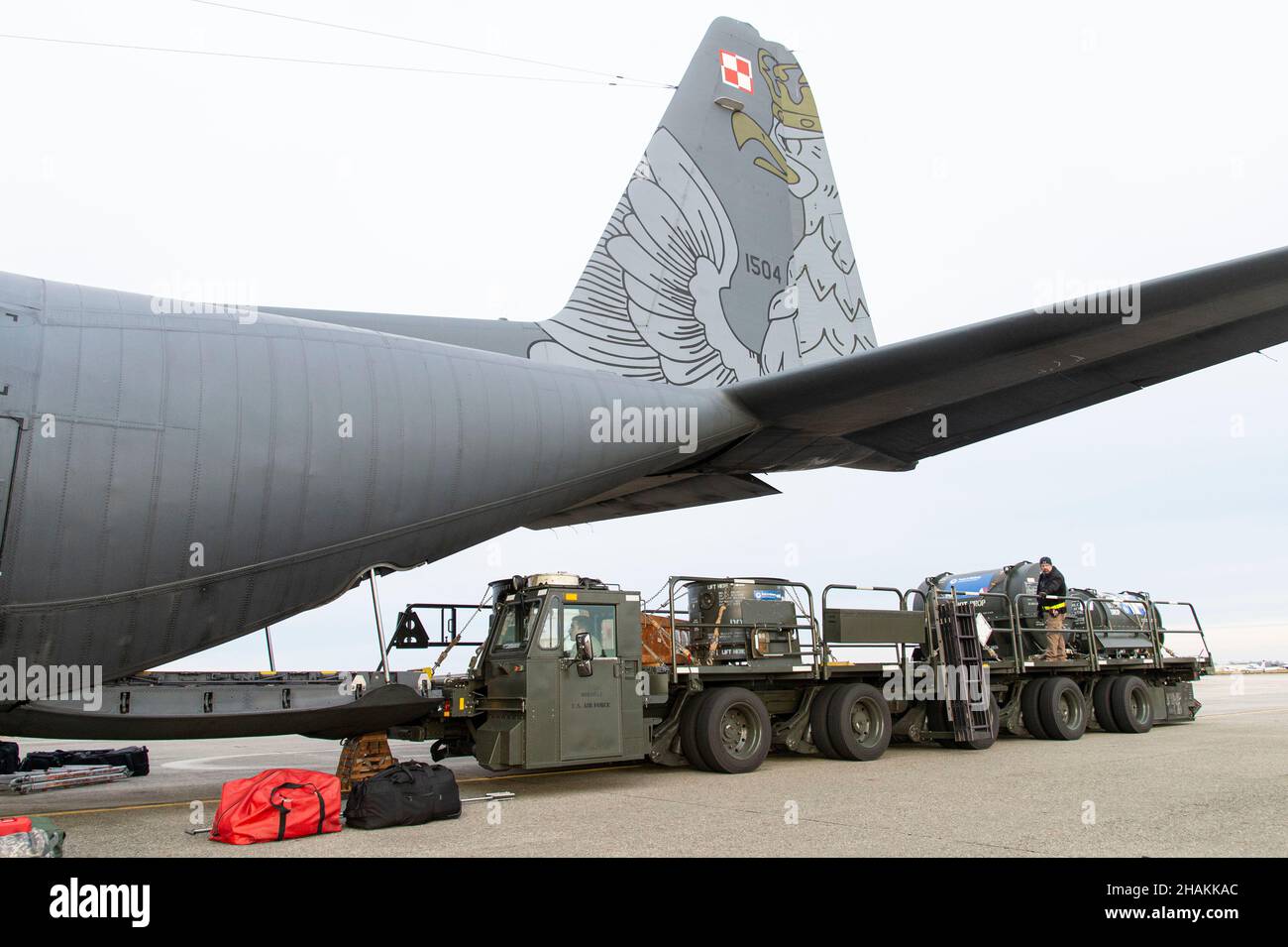 Ramp services personnel from the 436th Aerial Port Squadron secure ...