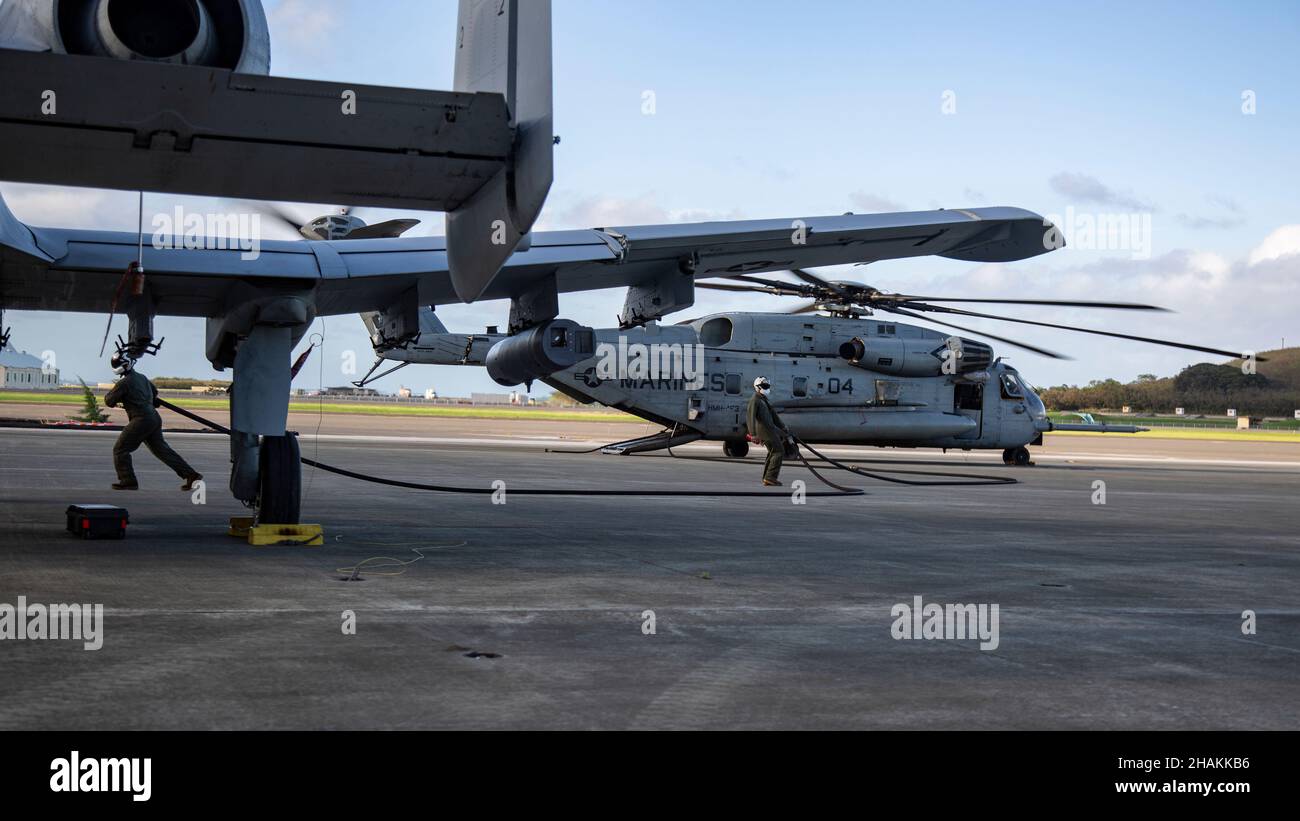 U.S. Marines with Marine Heavy Helicopter Squadron (HMH) 463 and Airmen ...