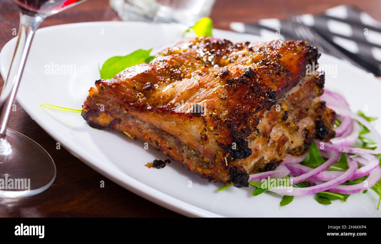 Roasted rack of pork Stock Photo - Alamy