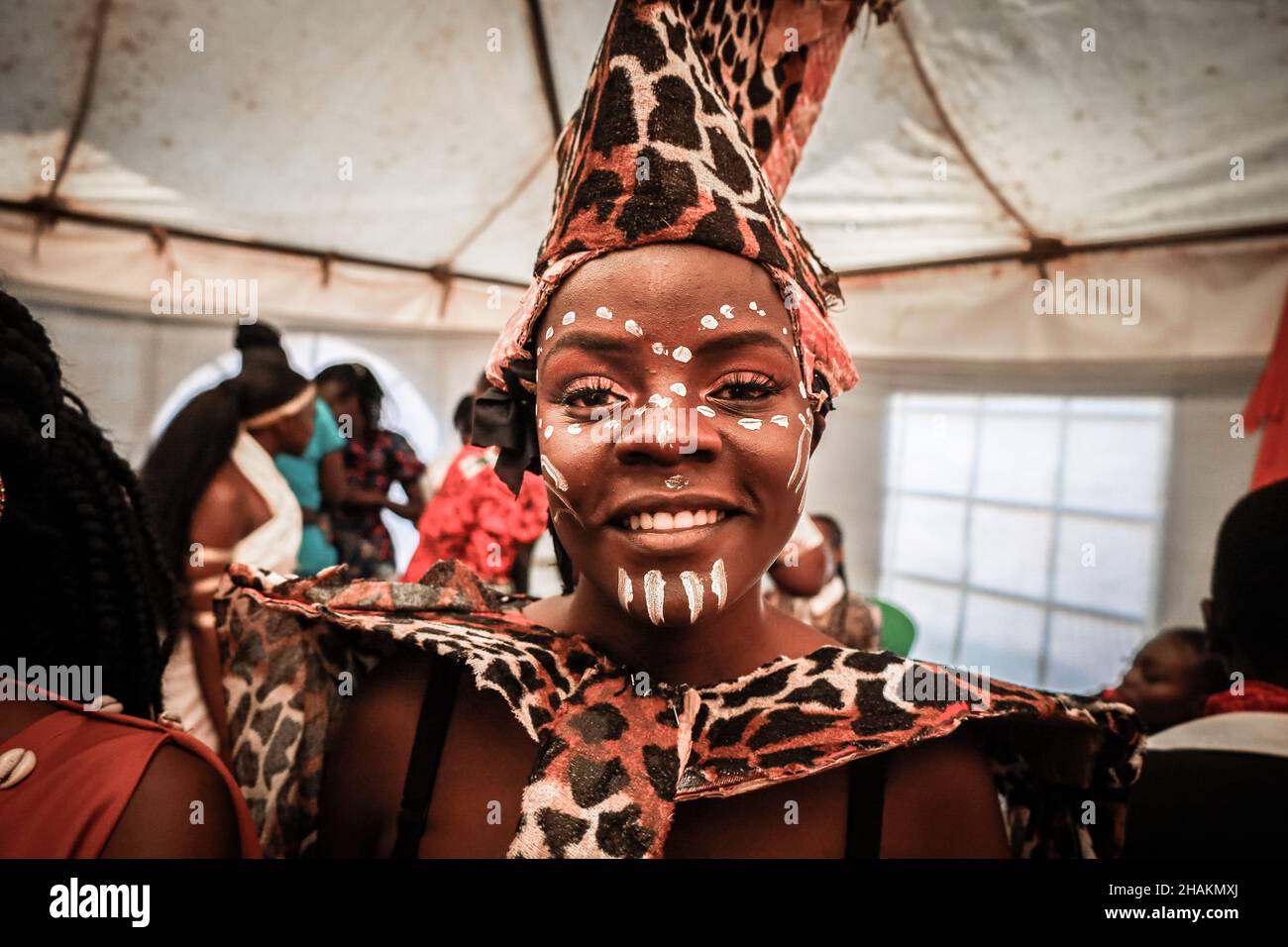 A young female model wearing an African outfit is seen inside the ...