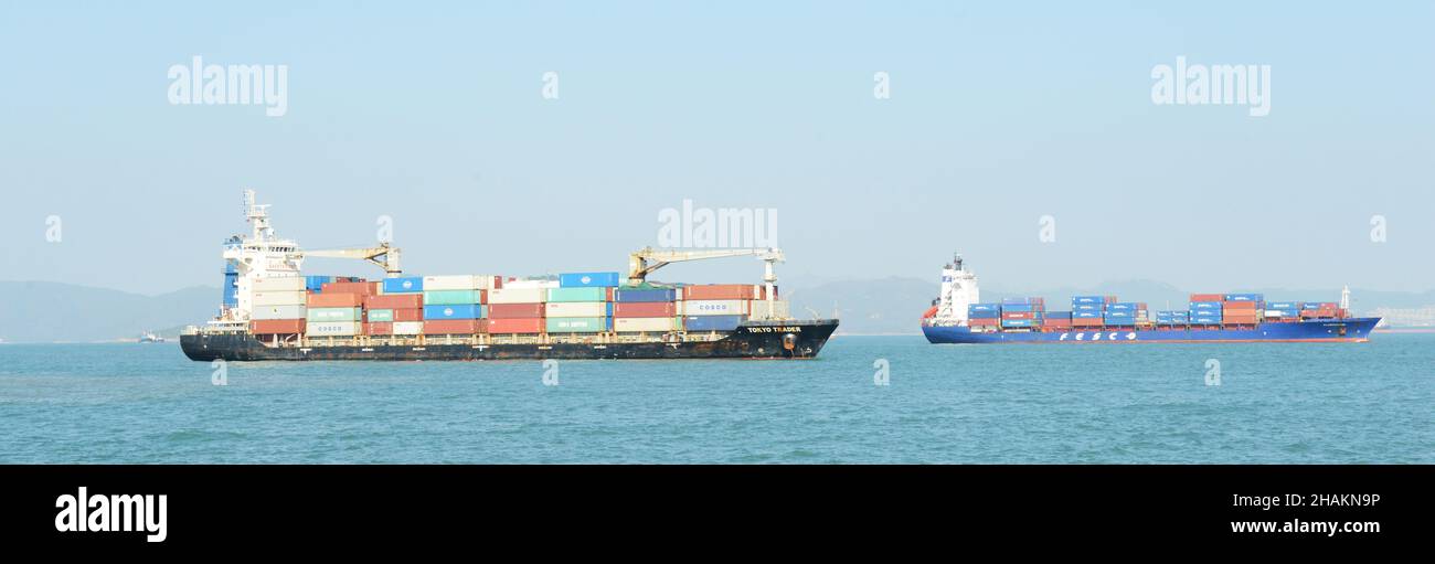 Tokyo Trader container ship docking not far from the Hong Kong harbour ...