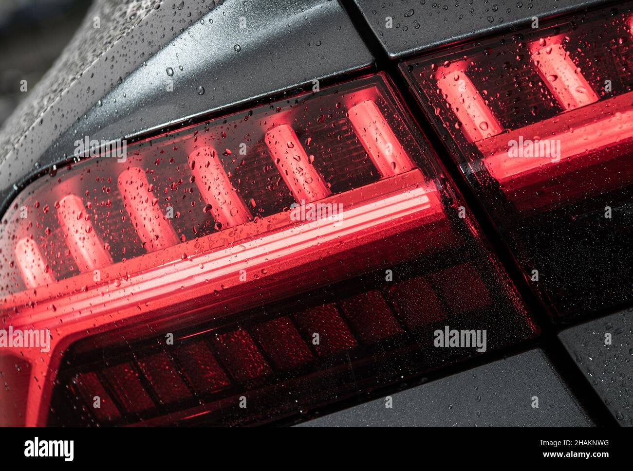 Modern Vehicle Wet From Car Washing Rear LED Light Close Up. Automotive ...