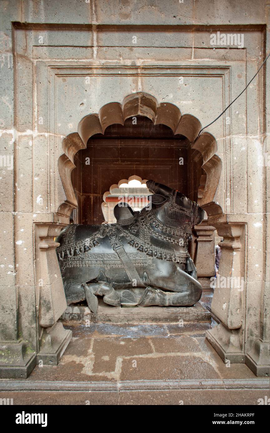 Statue of a Nandi(Bull) religious symbol in small shrine Stock Photo ...