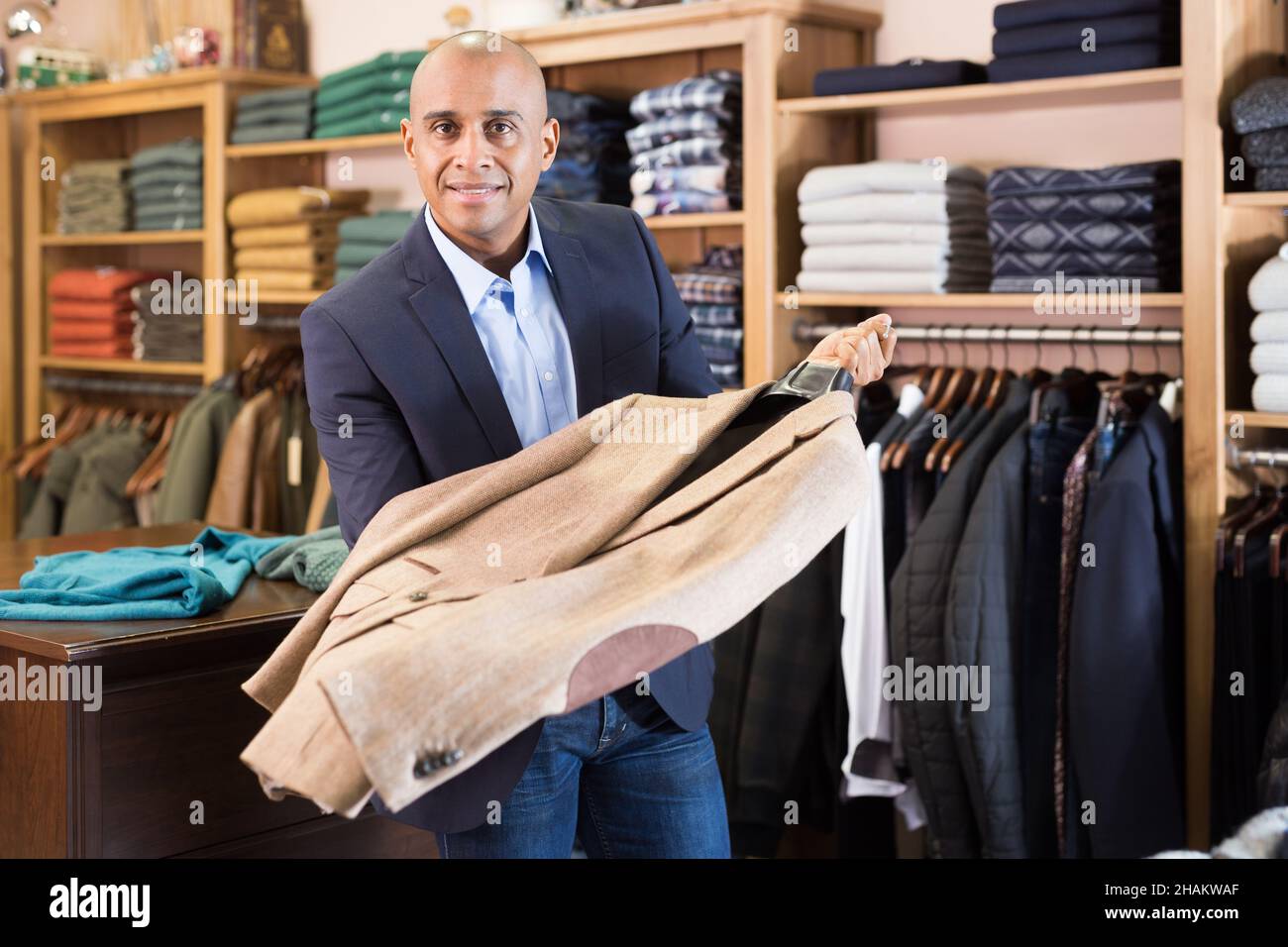 Man in jacket positive emotions hi-res stock photography and images - Alamy