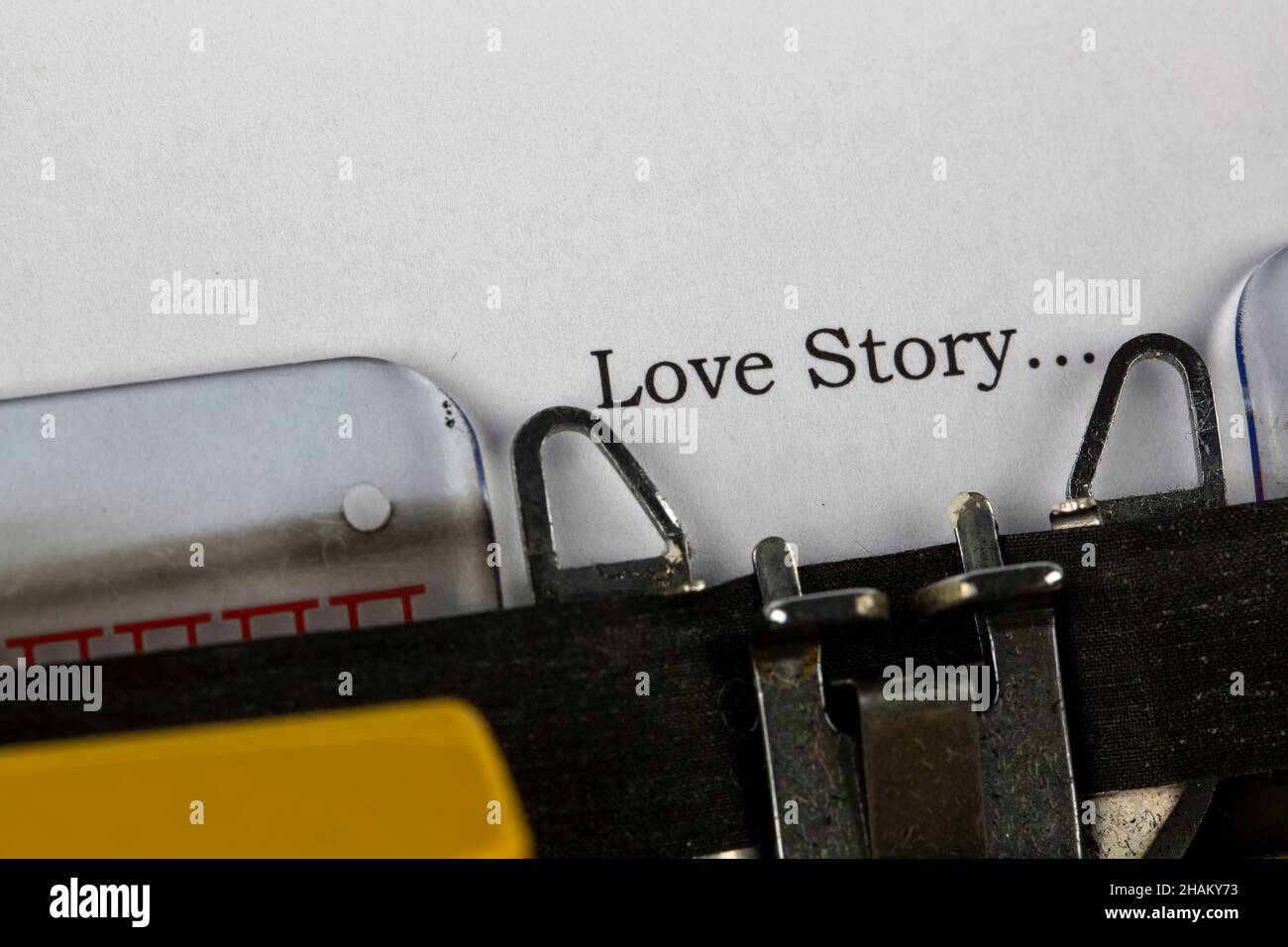 old typewriter with text Love Story Stock Photo - Alamy