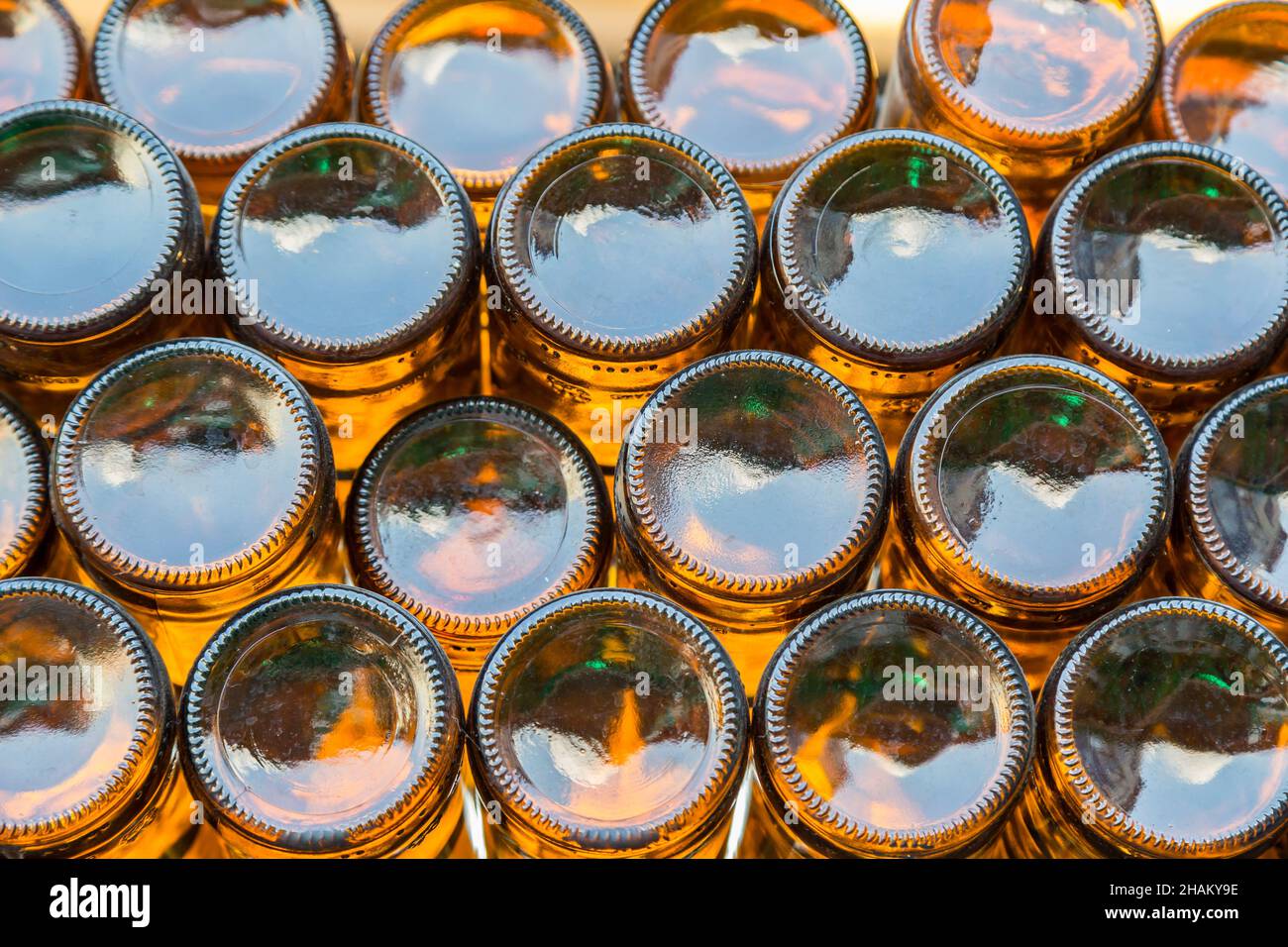 Row of bottom beer bottle background Stock Photo - Alamy