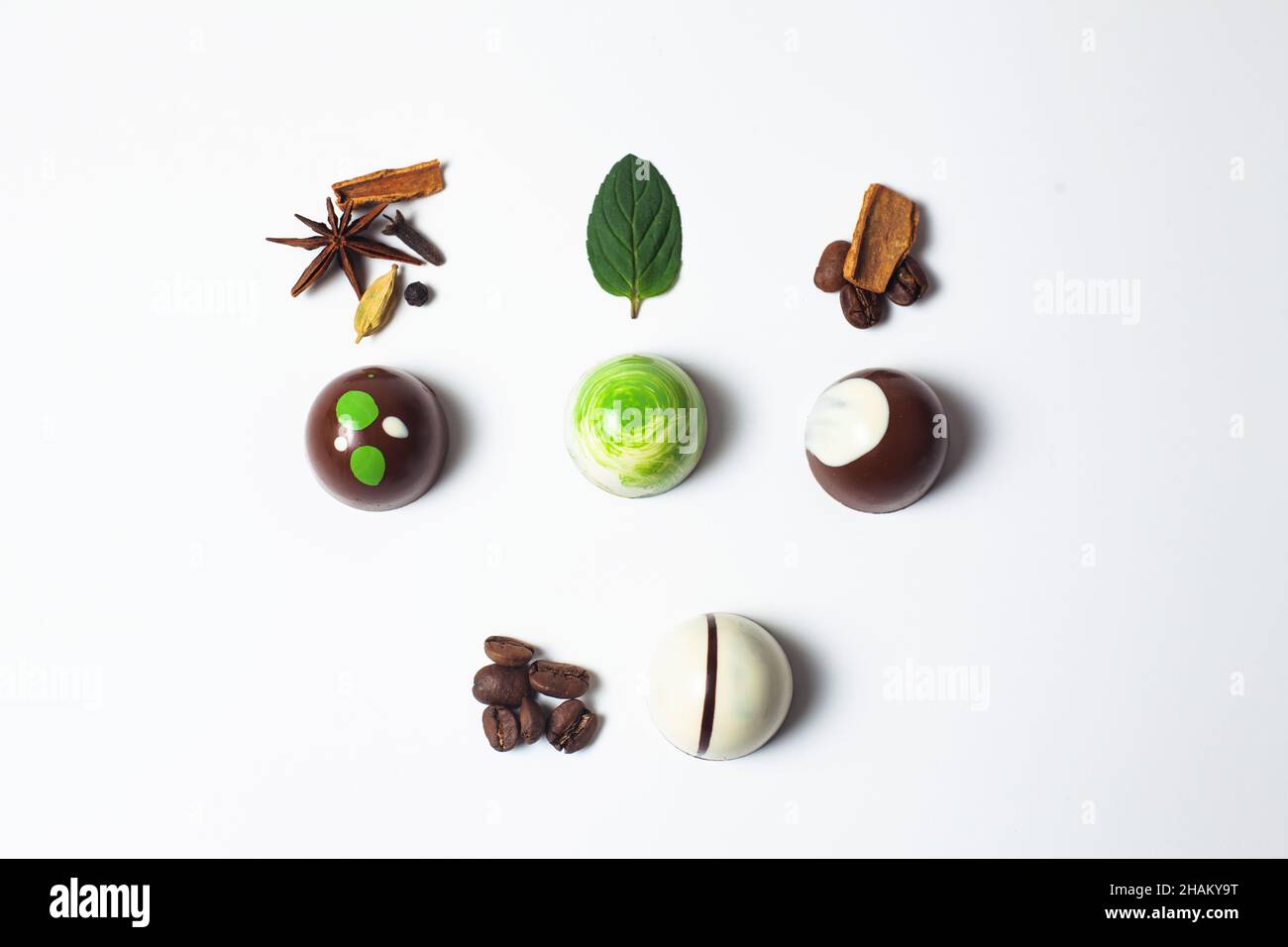 Mexican Colorful chocolate candy bonbons with mint leaves, cinnamon and ...