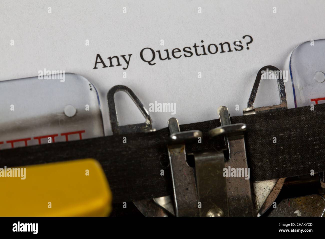 old typewriter with text any questions Stock Photo - Alamy