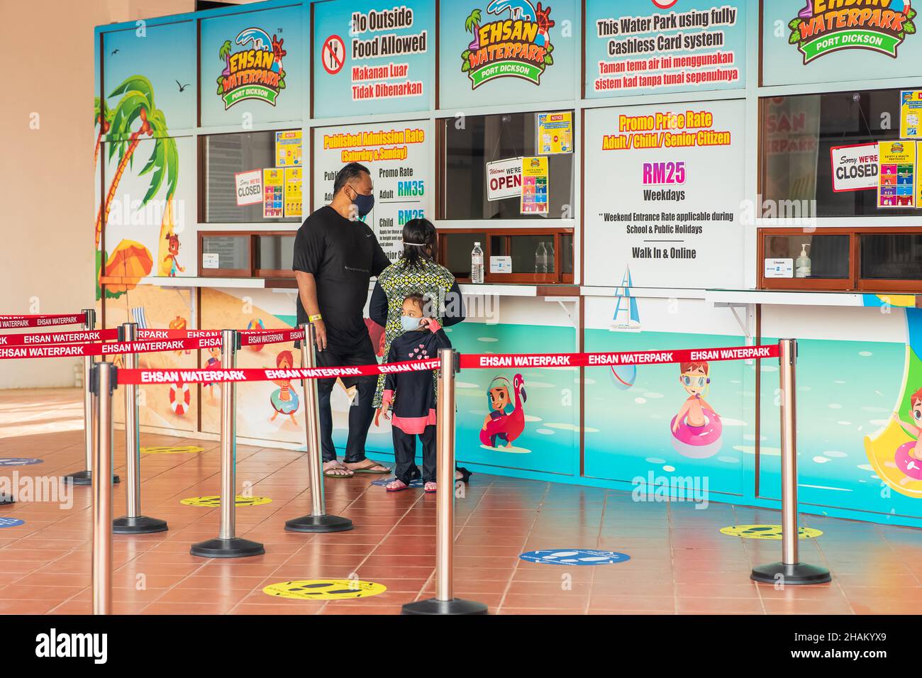 Port Dickson, Malaysia - Nov 19, 2021: Family buying ticket entrance at ...