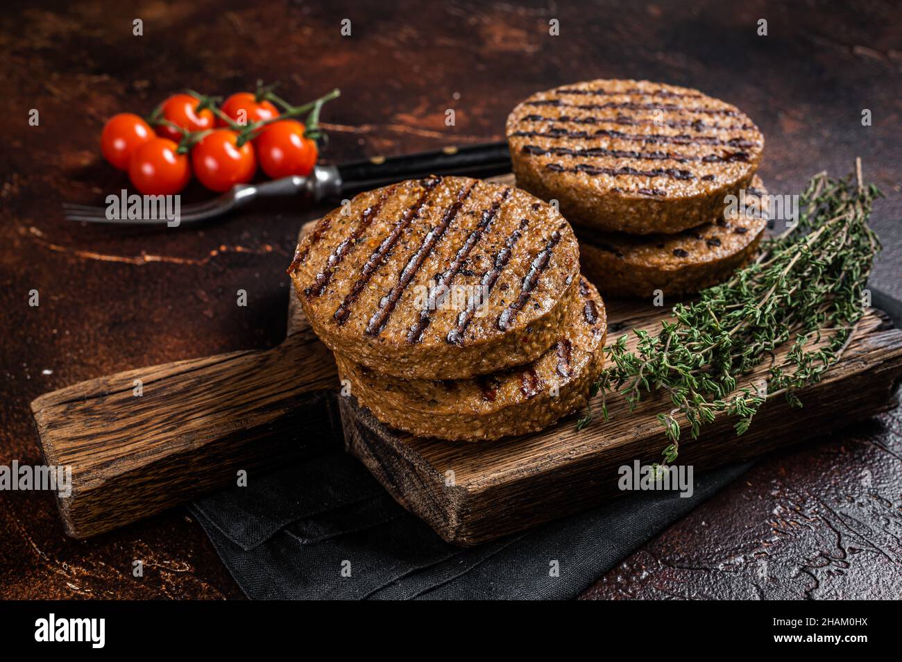 BBQ Grilled plant based meat burger patties, vegan cutlets on wooden ...
