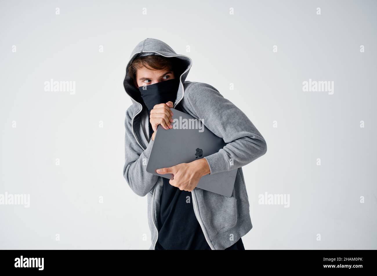 Male thief hooded head hi-res stock photography and images - Alamy