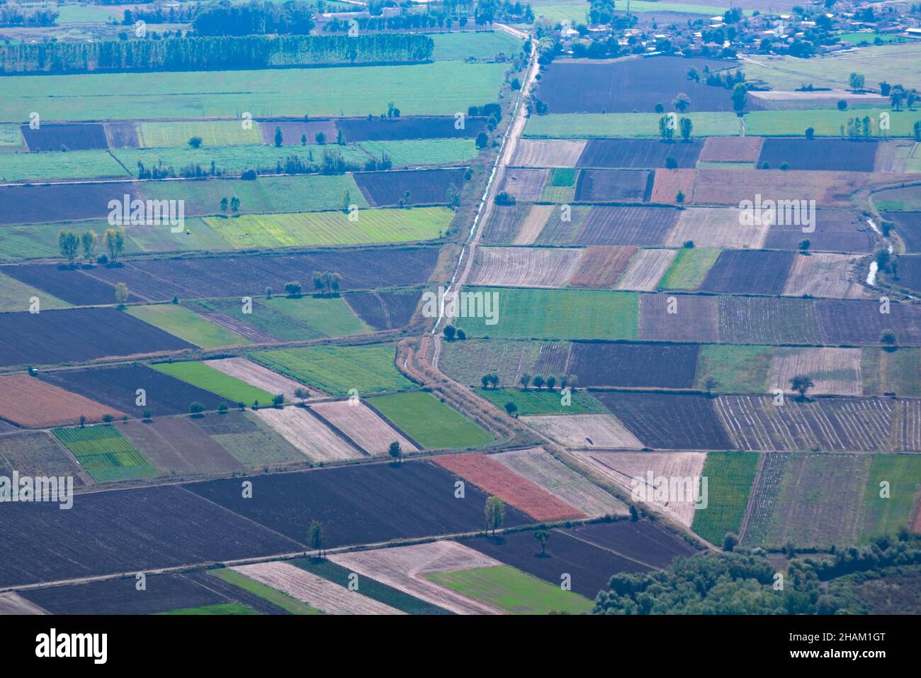 Agricultural fields. Harvested agricultural fields and dirt roads from ...