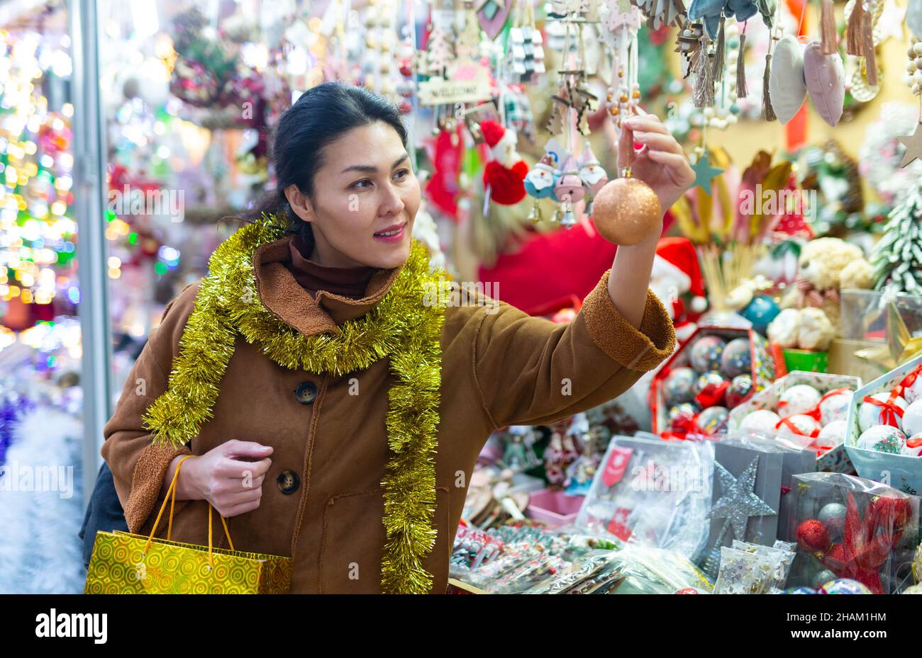 Asian female choosing decorations hi-res stock photography and images ...