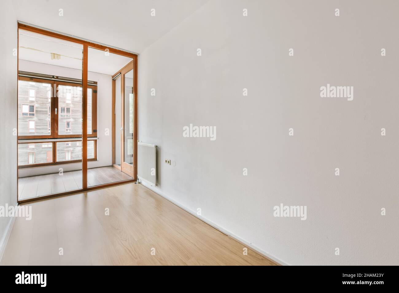 Elite room with a window on the whole wall Stock Photo - Alamy