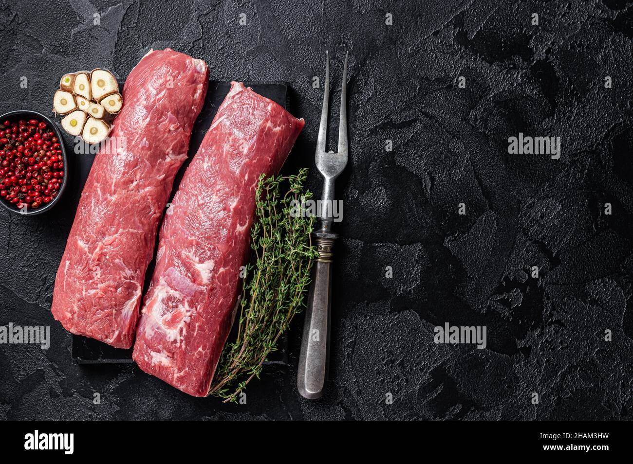Fresh Raw lamb tenderloin, Mutton loin fillet Meat on marble board ...