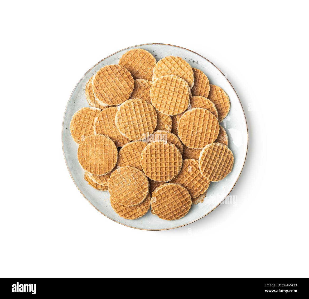 Sweet caramel mini waffles isolated on white background Stock Photo - Alamy