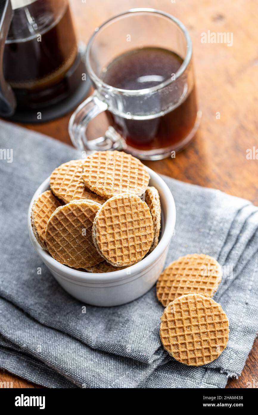Sweet caramel mini waffles in bowl Stock Photo - Alamy