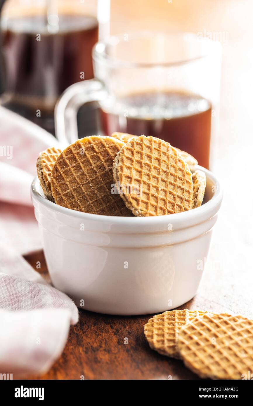 Sweet caramel mini waffles in bowl Stock Photo - Alamy