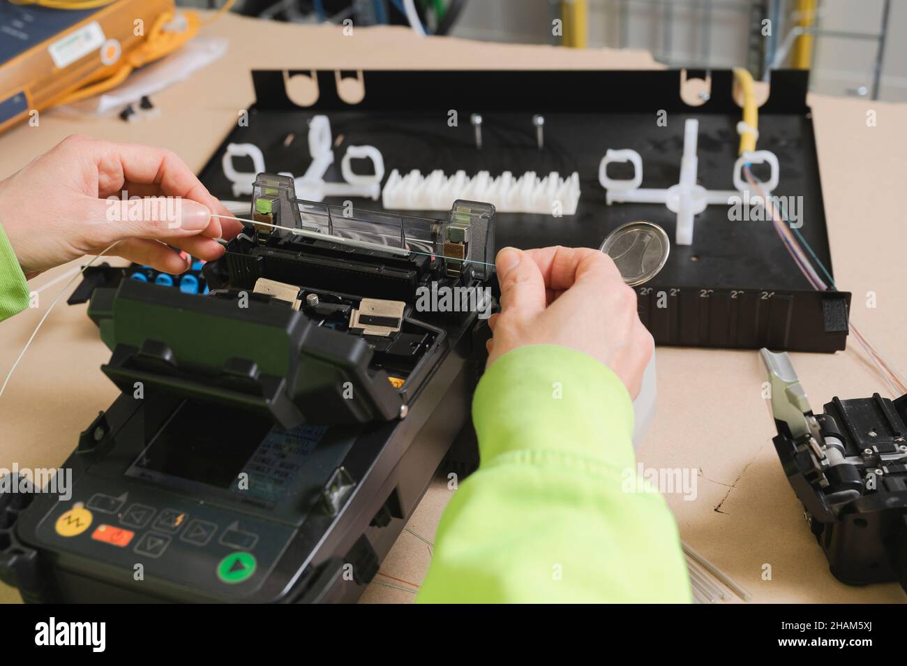 Engineer repairing electronic device Stock Photo - Alamy