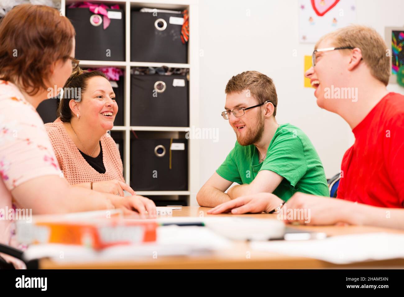 Disabled people laughing and talking Stock Photo - Alamy