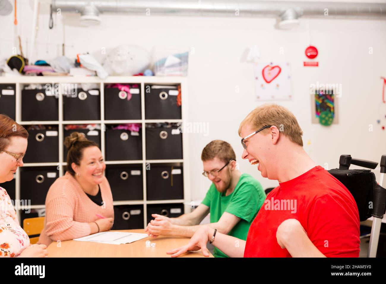 Disabled people laughing and talking Stock Photo - Alamy