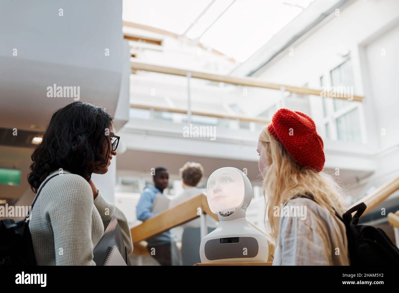 Students using voice assistant in library Stock Photo - Alamy
