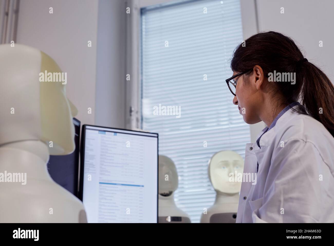Female engineer working on computer Stock Photo - Alamy