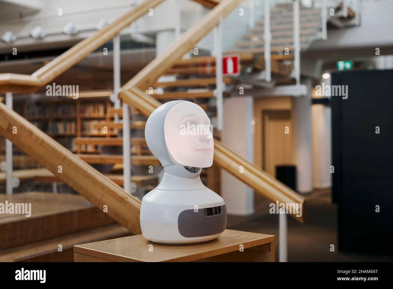 Robot voice assistant in library Stock Photo - Alamy