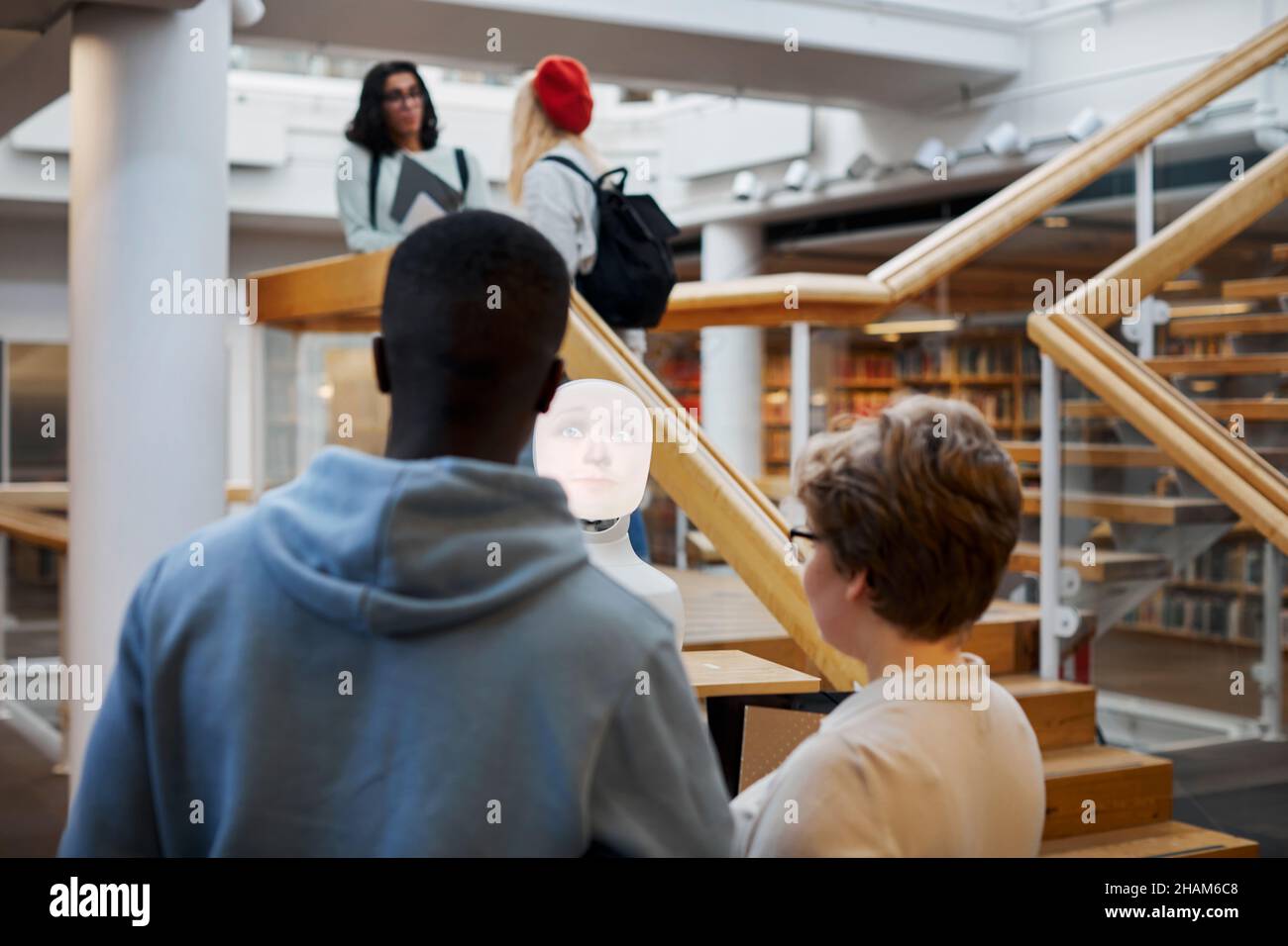 Students using voice assistant in library Stock Photo - Alamy