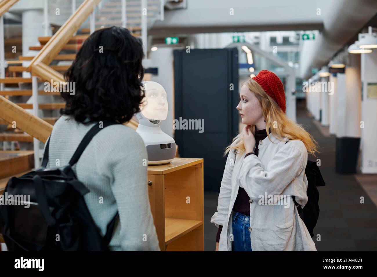 Students using voice assistant in library Stock Photo - Alamy