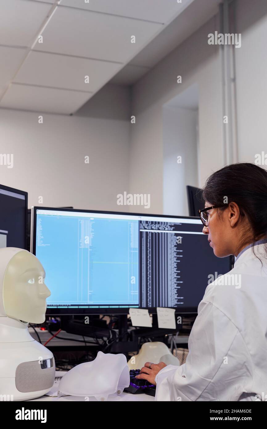 Female engineer working on computer Stock Photo - Alamy