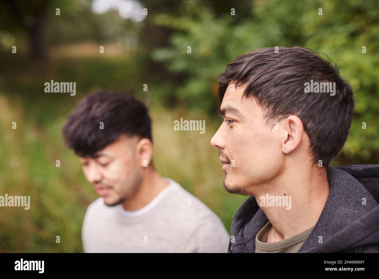 Smiling man looking away Stock Photo - Alamy