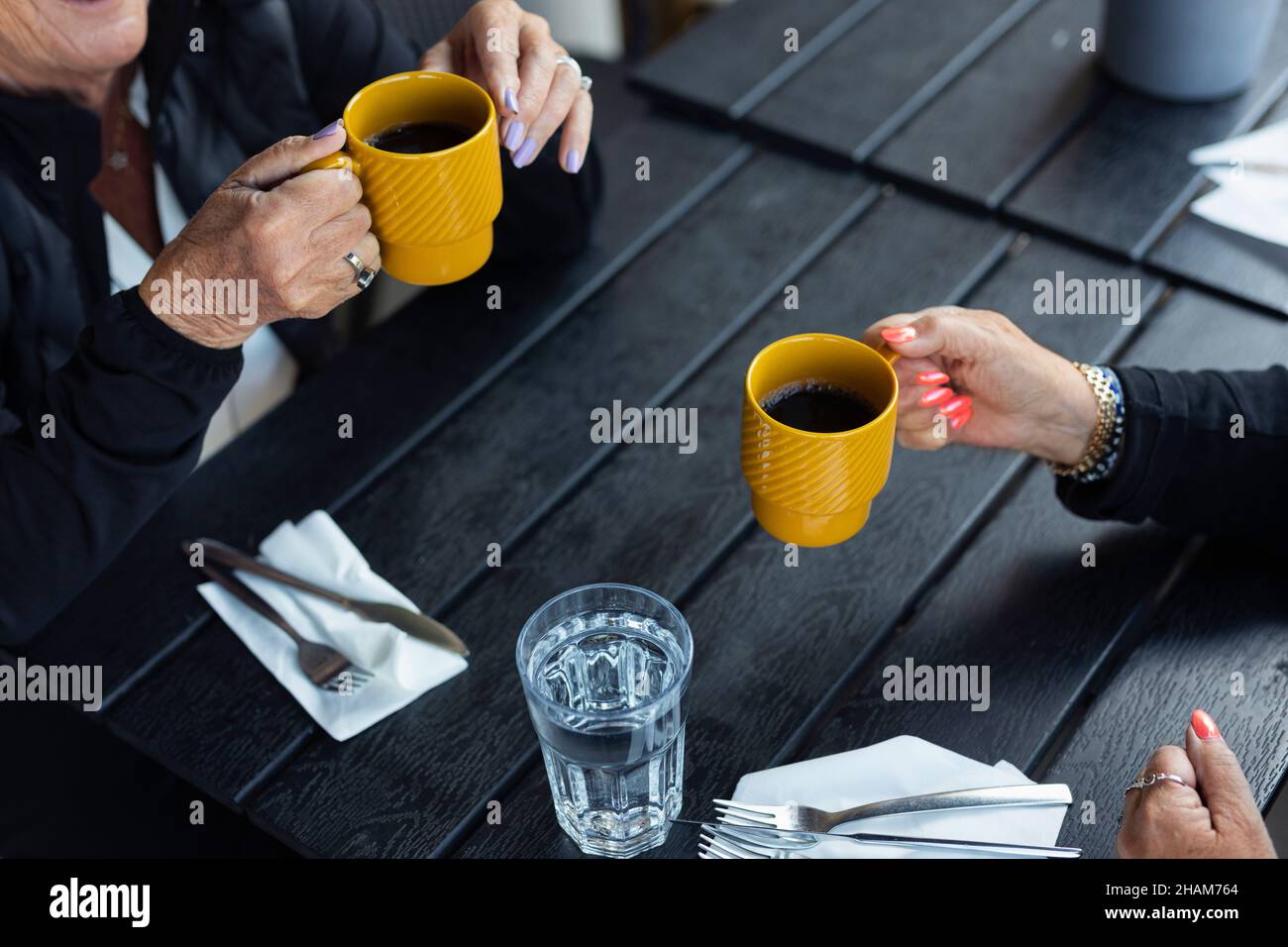 Senior women having coffee together Stock Photo - Alamy