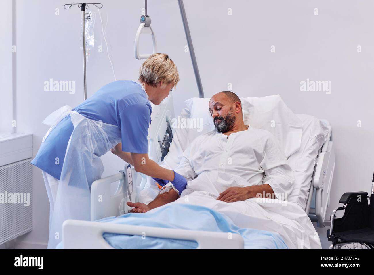 Nurse taking care patient in hi-res stock photography and images - Alamy