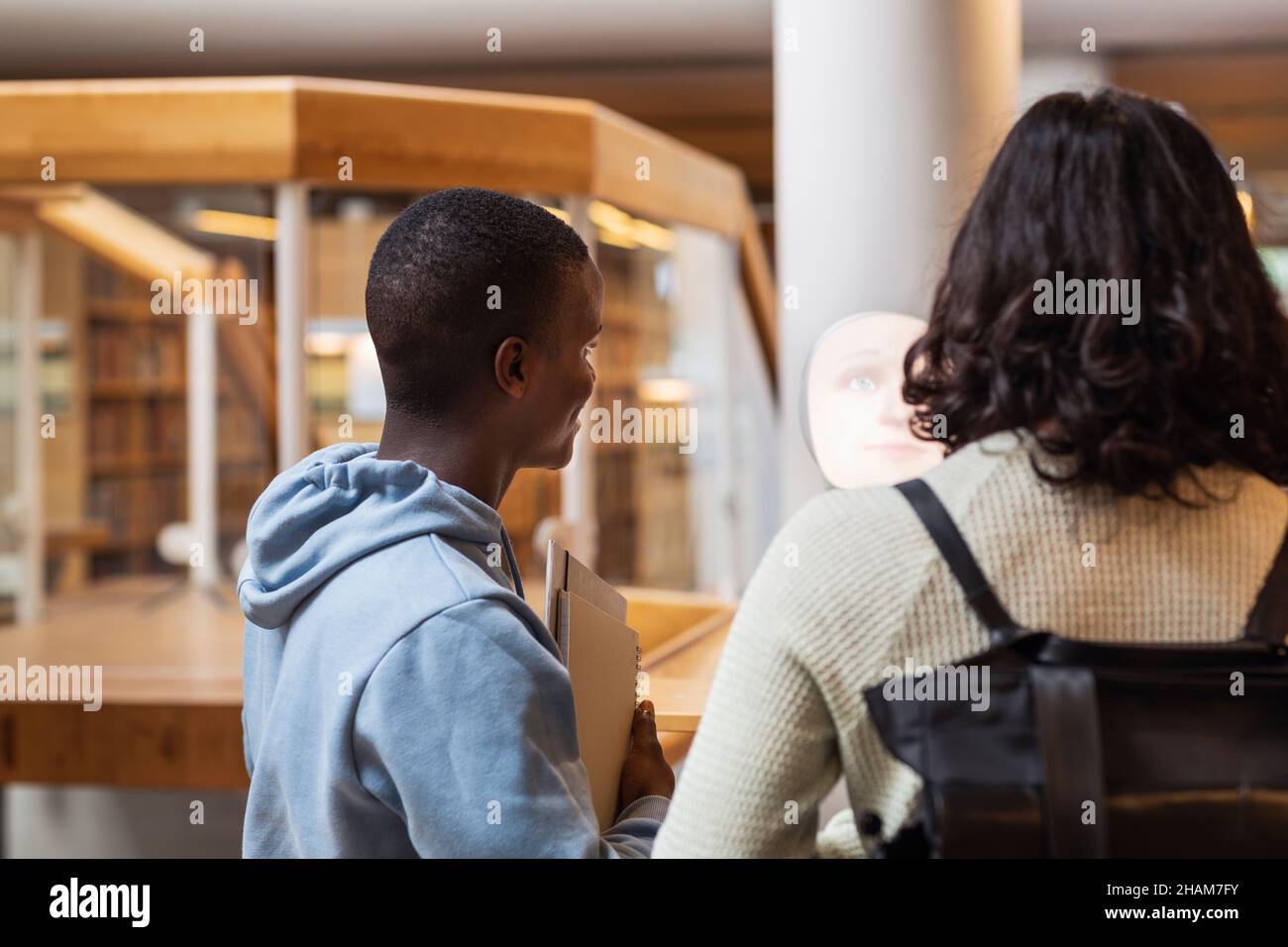 Using voice assistant hi-res stock photography and images - Alamy