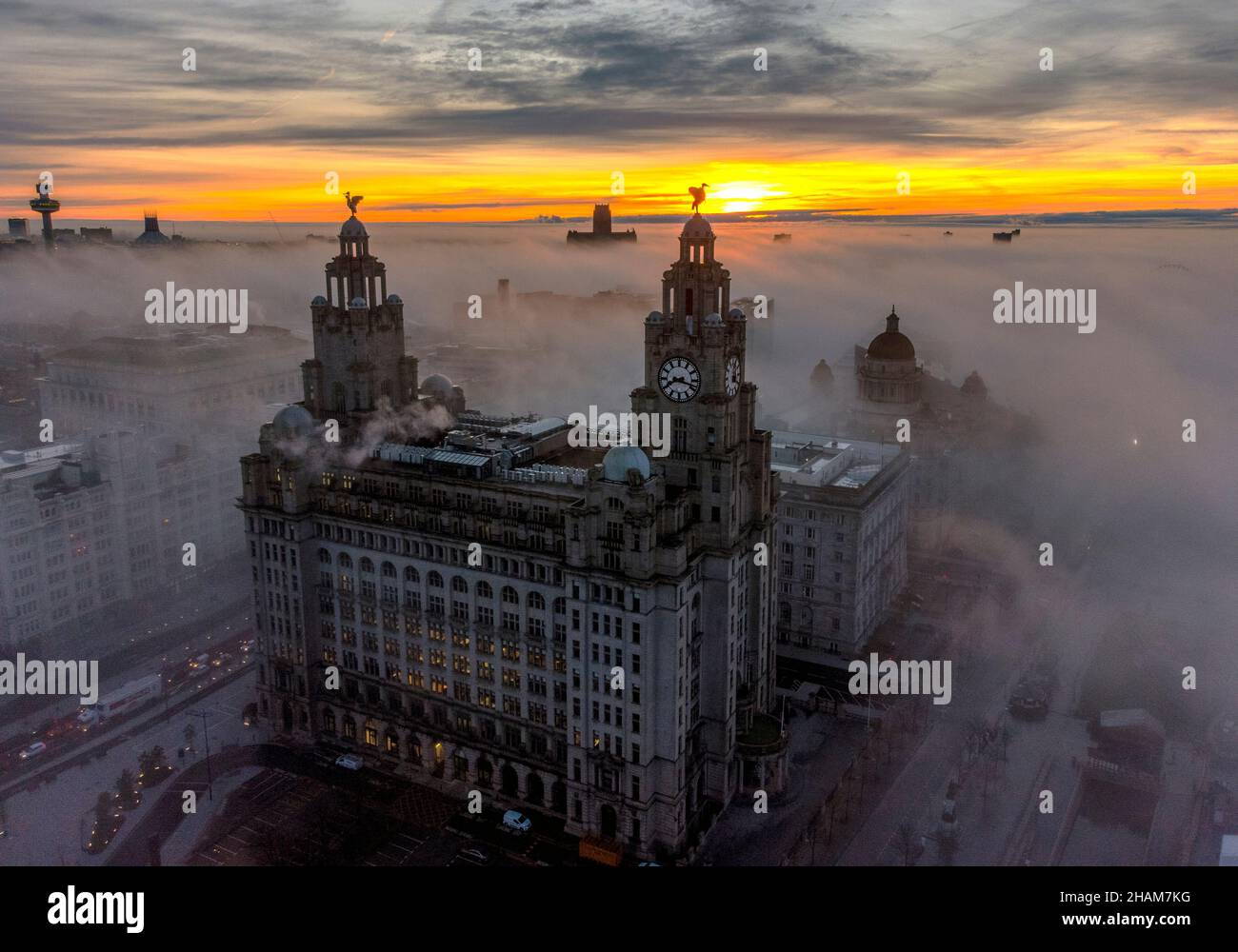The Royal Liver Building surrounded by early morning fog in Liverpool ...